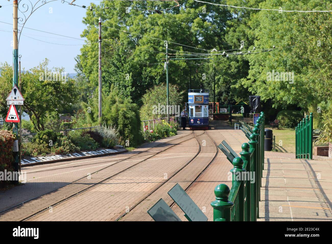 A tram approaches Colyton tram station Stock Photo - Alamy