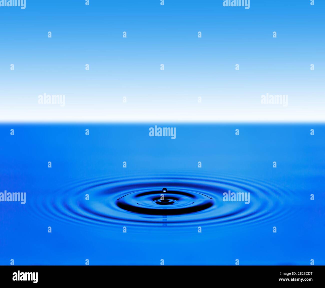 Circular waves on the surface of the blue water Stock Photo - Alamy