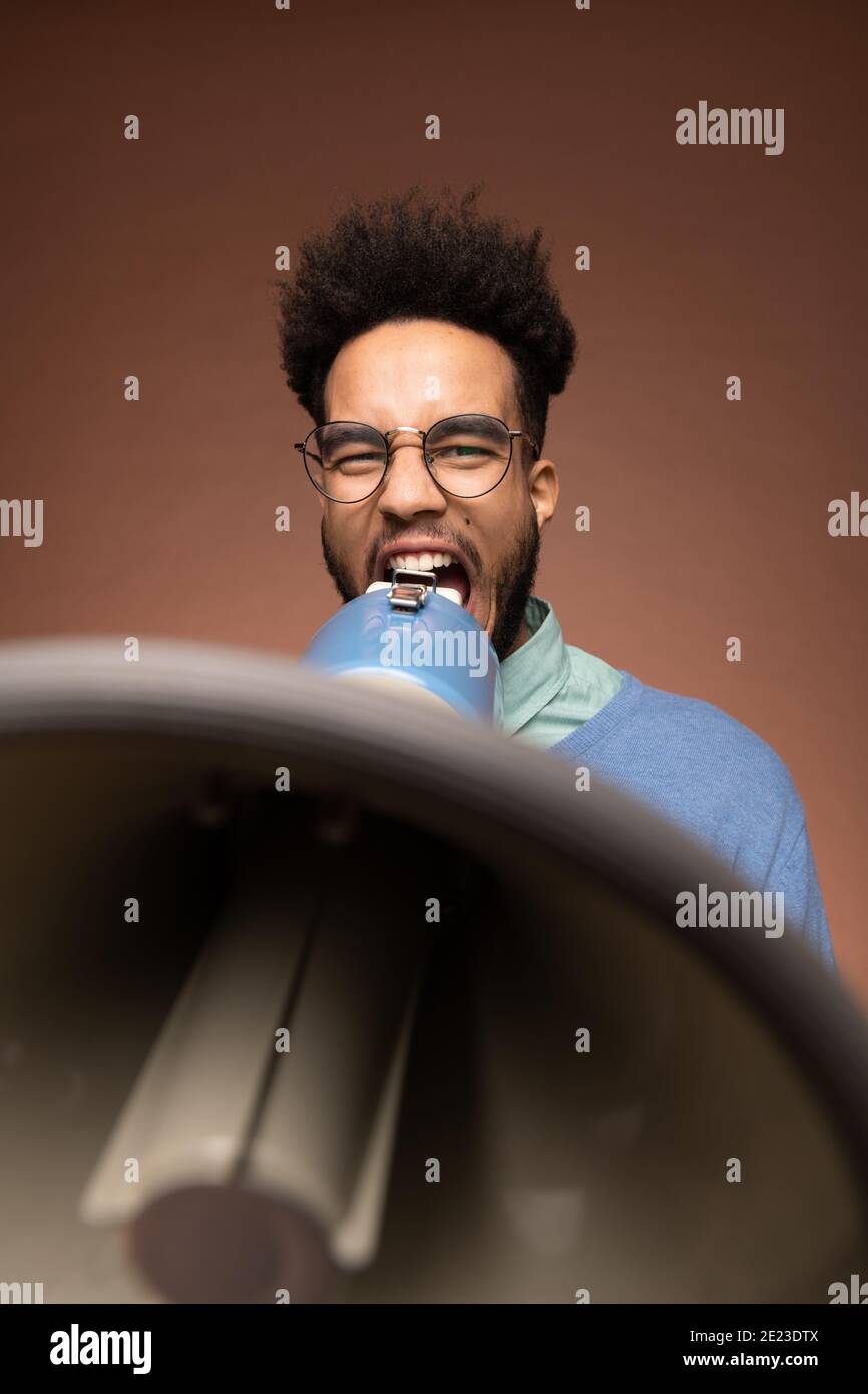 Casual african man shouting screaming hi-res stock photography and ...