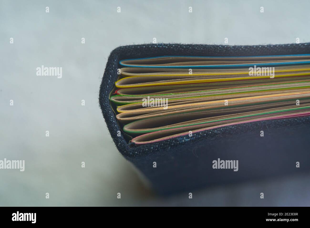 Folder portfolio with colorful paper sheet Stock Photo - Alamy