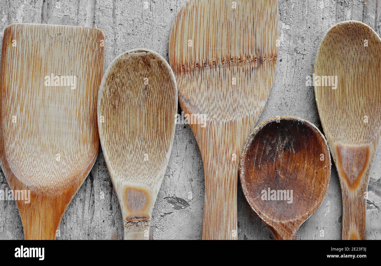 different wooden spoons on the rustic background Stock Photo - Alamy