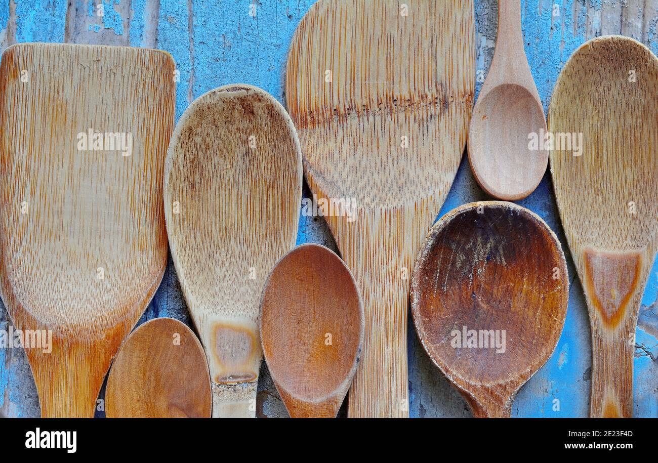 different wooden spoons on the rustic background Stock Photo - Alamy
