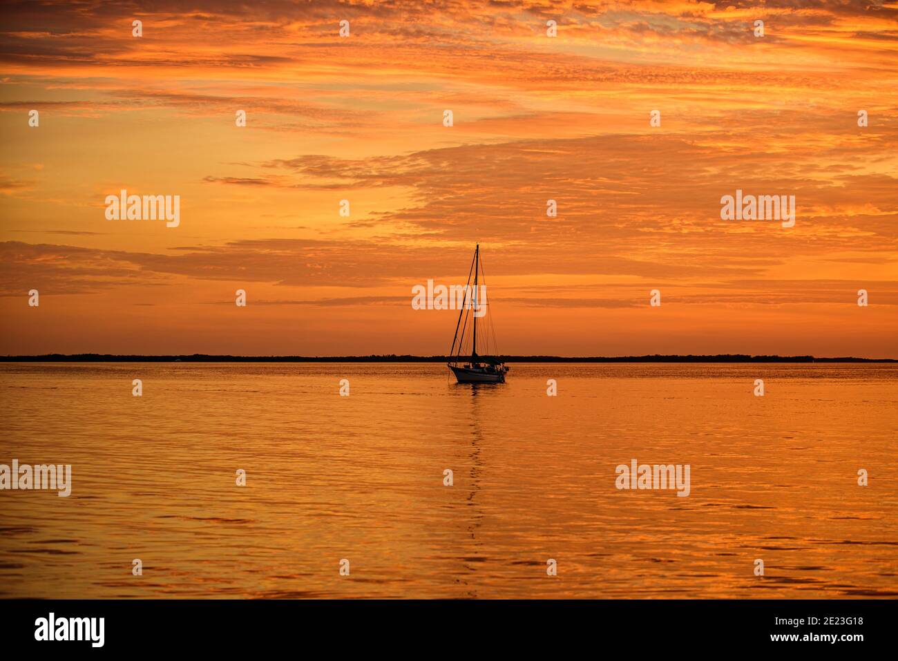 Boat on the sea at sunset. Sailboats with sails. Ocean yacht sailing ...