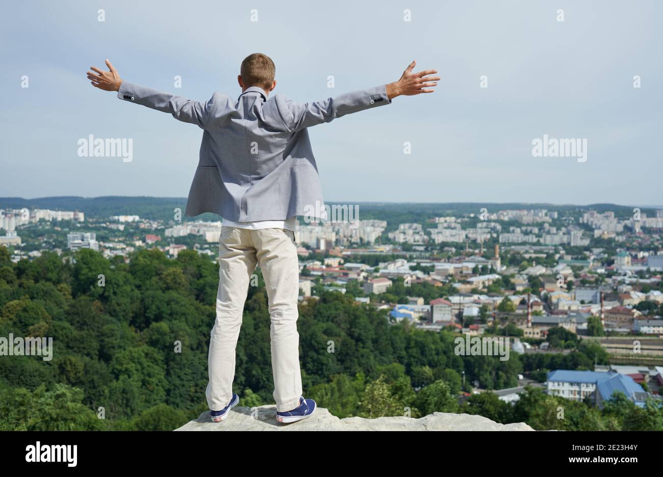 A happy businessman in a celebrating pose Stock Photo - Alamy