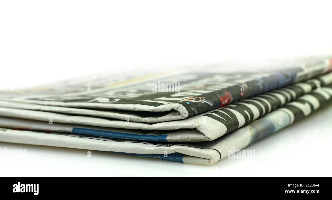 Newspapers folded and stacked concept for global communications ...
