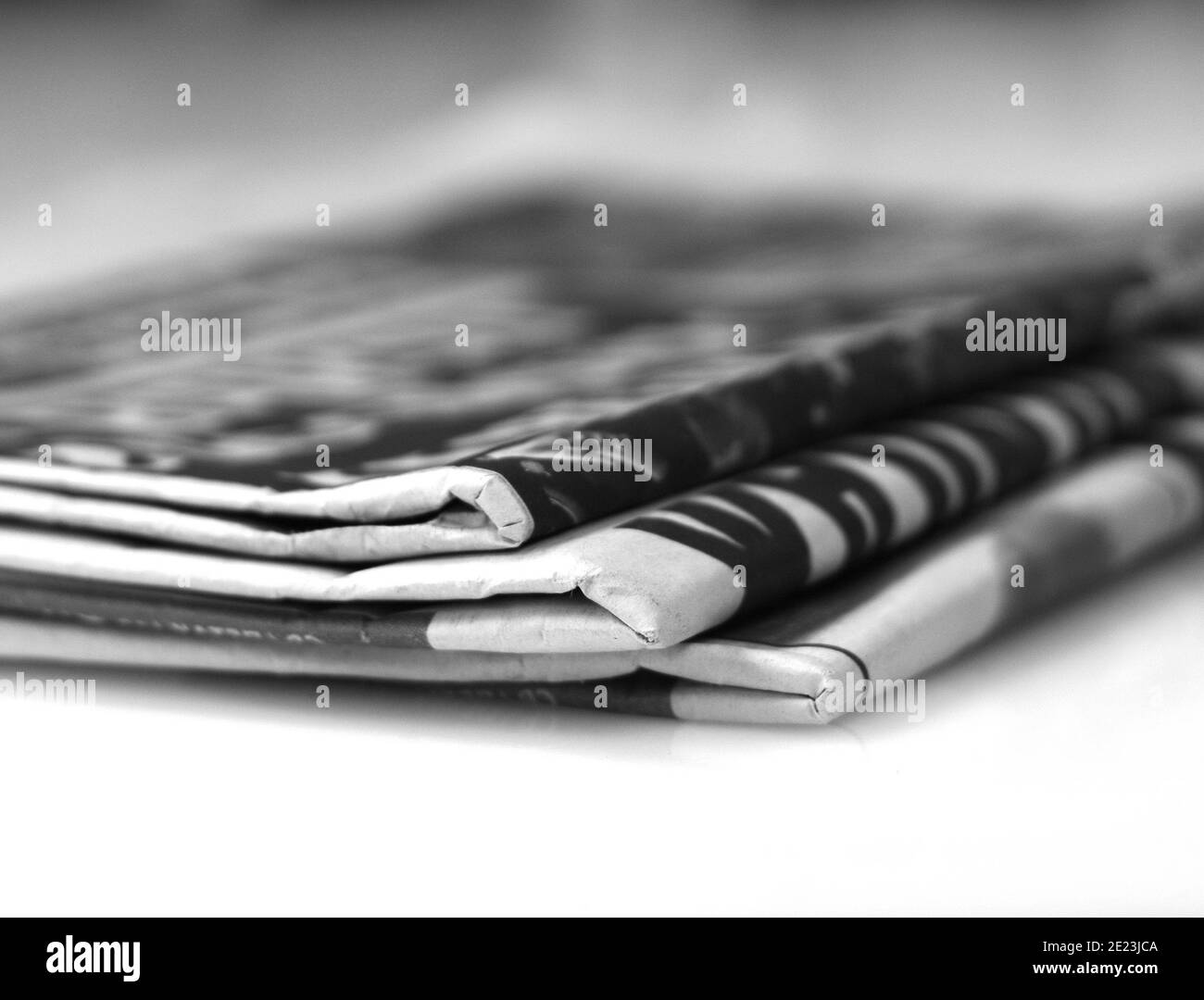 Newspapers folded and stacked concept for global communications ...