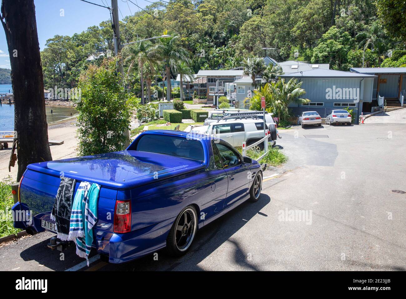 Blue Holden made SS Ute vehicle parked beside a Sydney beach with beach ...