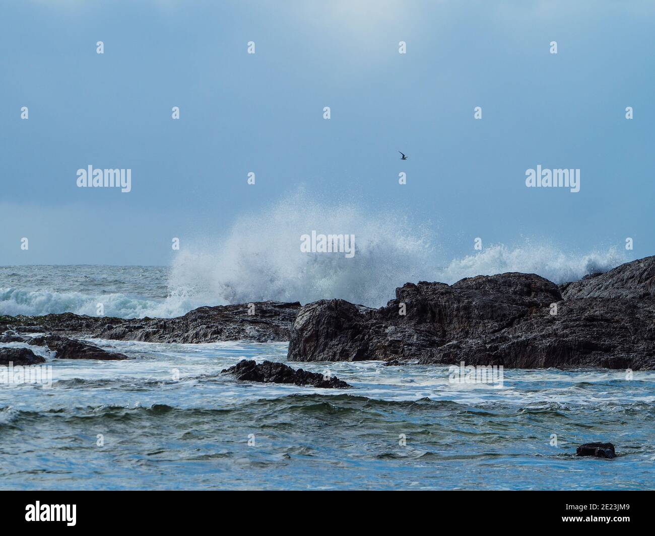 Wild waves crashing into rocks and exploding frothy white water high ...