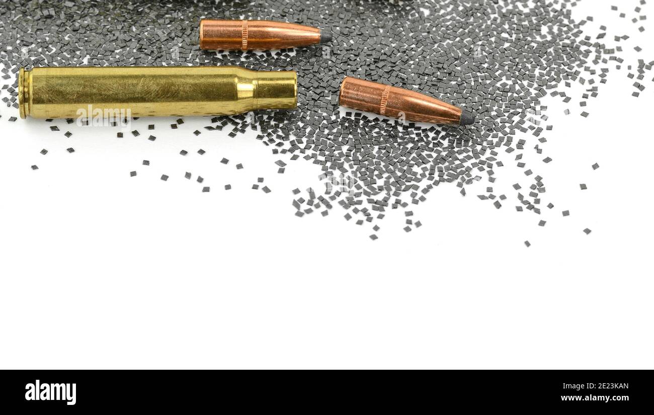 A rifle bullet, empty shell, gunpowder on white background. Hunting ...