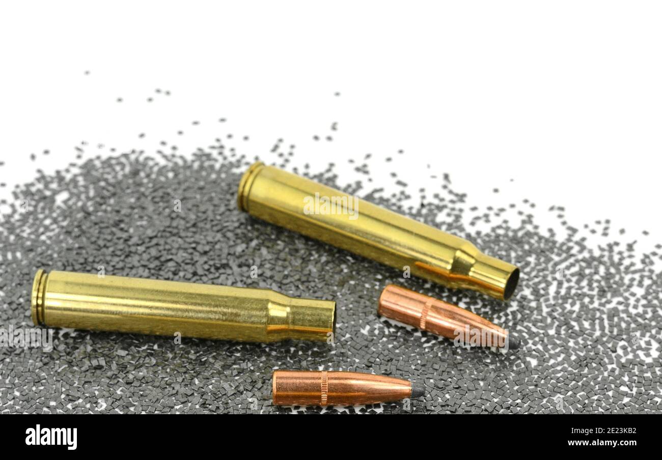 A rifle bullet, empty shell, gunpowder on white background. Hunting ...