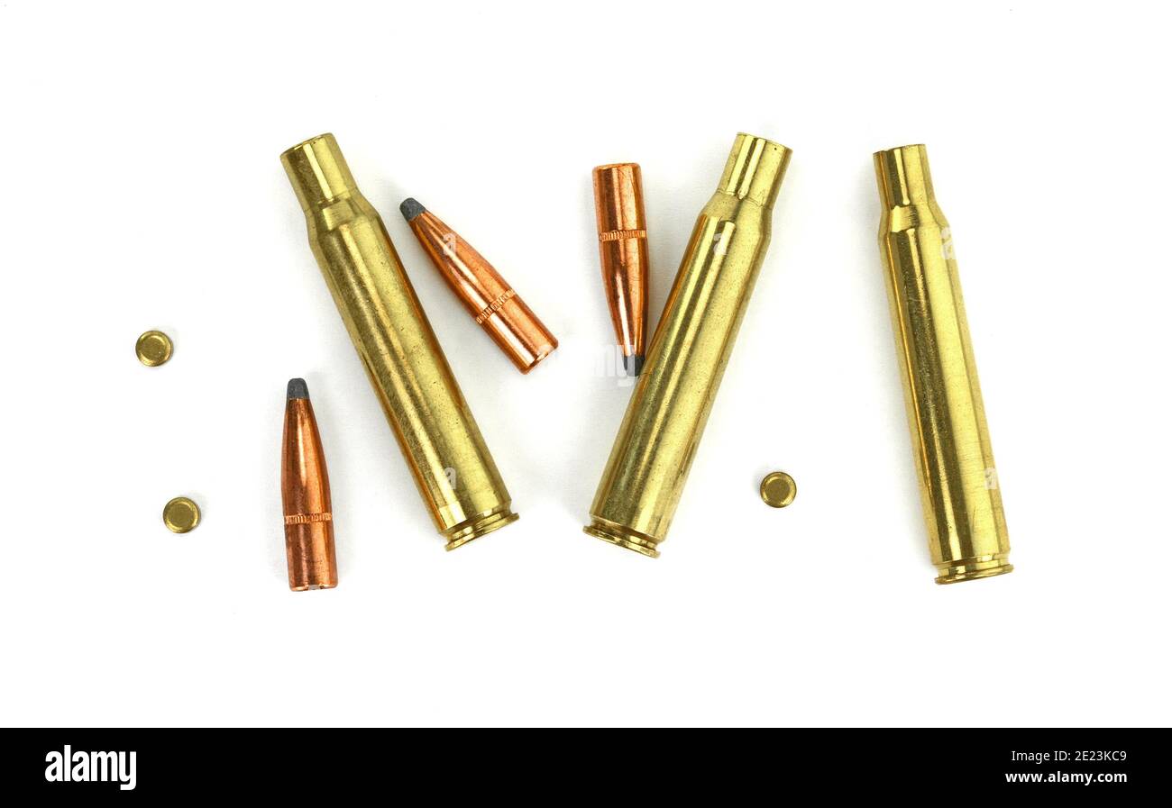 A rifle bullet, empty shell, gunpowder on white background. Hunting ...