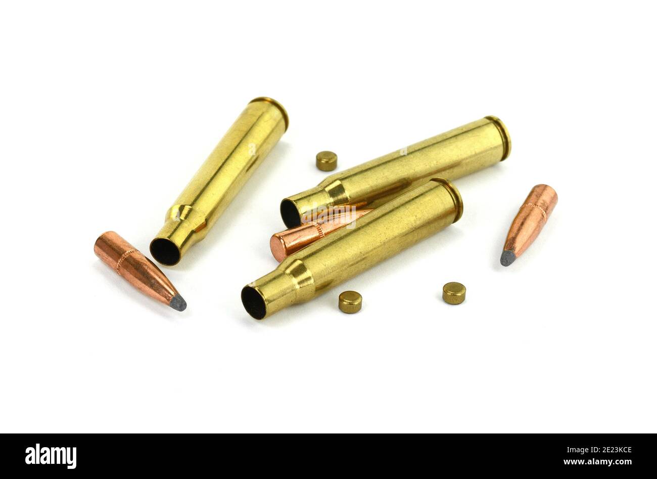 A rifle bullet, empty shell, gunpowder on white background. Hunting ...