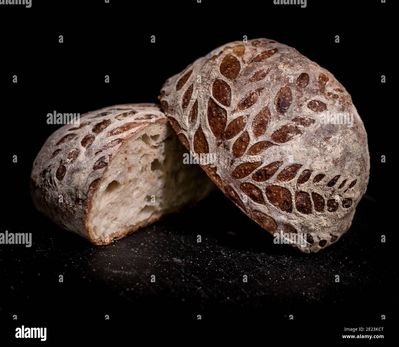 Cut Sourdough Loaf with Fancy Scoring Pattern Stock Photo - Alamy