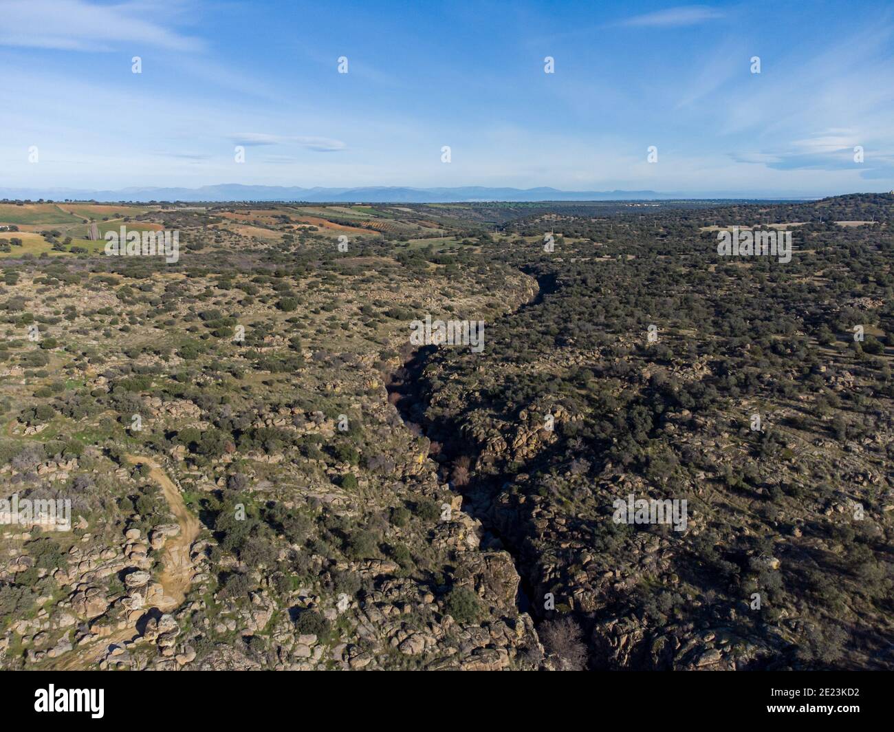 Aerial view of a landscape with greenery and a narrow pathway in Span ...