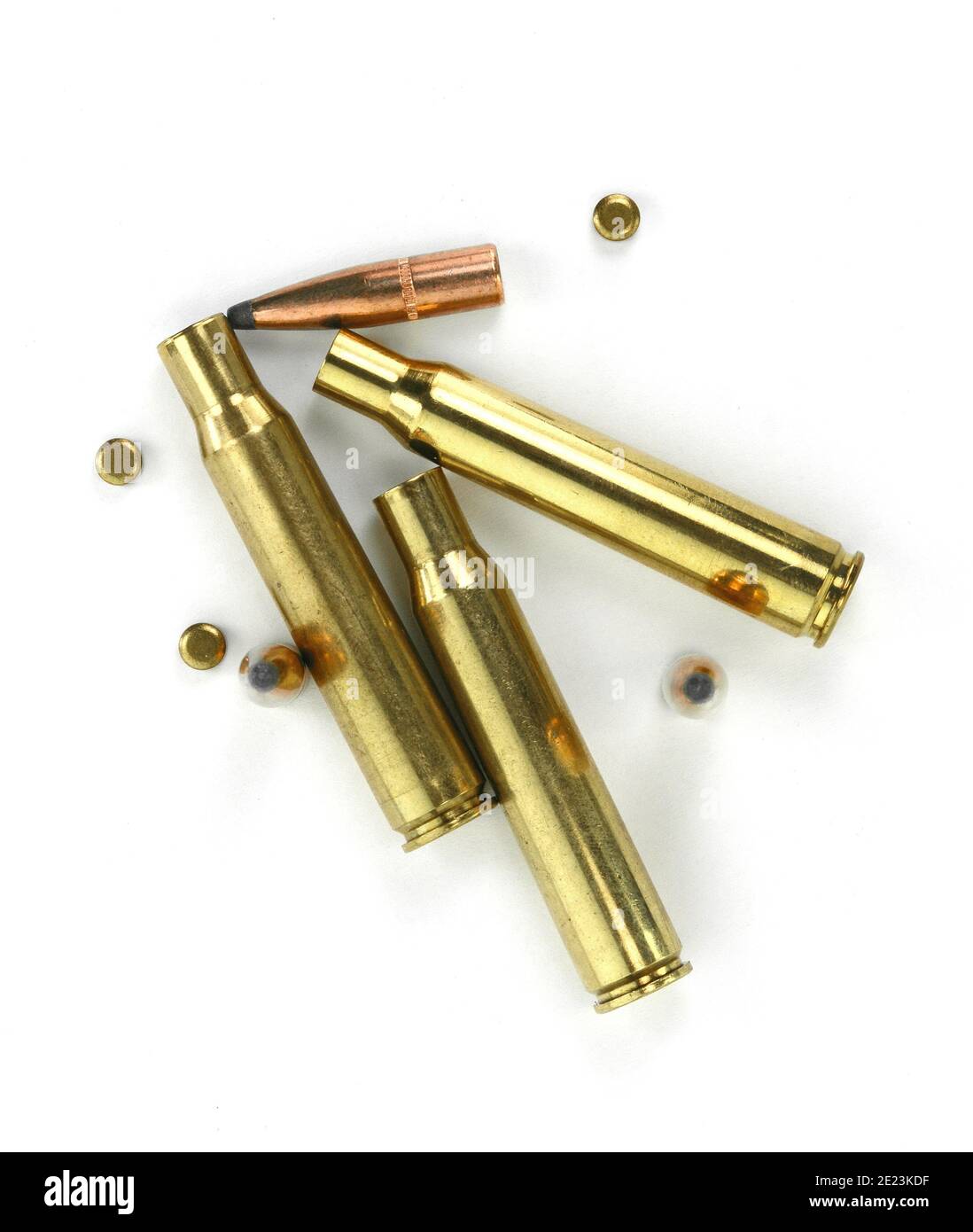 A rifle bullet, empty shell, gunpowder on white background. Hunting ...