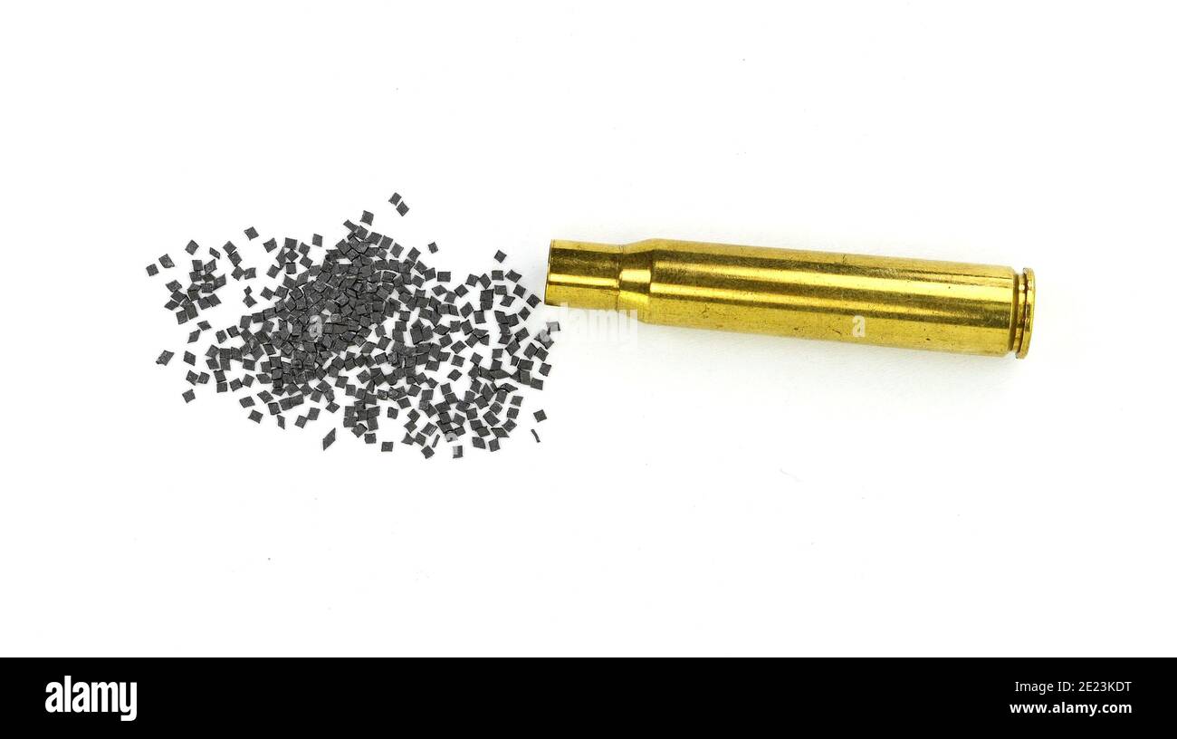A rifle bullet, empty shell, gunpowder on white background. Hunting ...