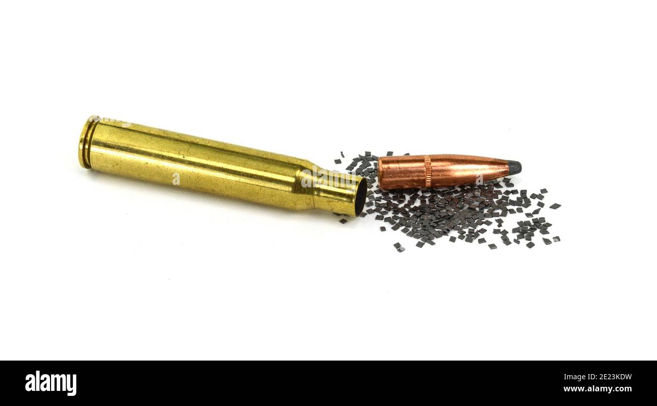 A rifle bullet, empty shell, gunpowder on white background. Hunting ...