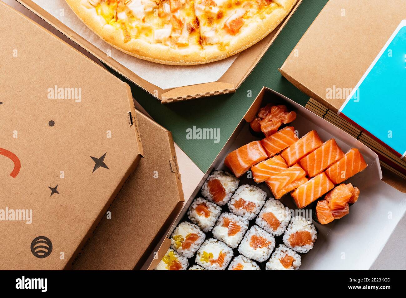 Set of delivery food. pizza sushi rolls Stock Photo - Alamy