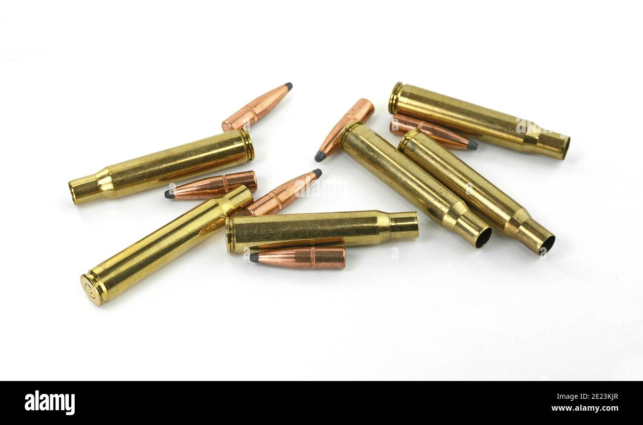 A rifle bullet, empty shell, gunpowder on white background. Hunting ...