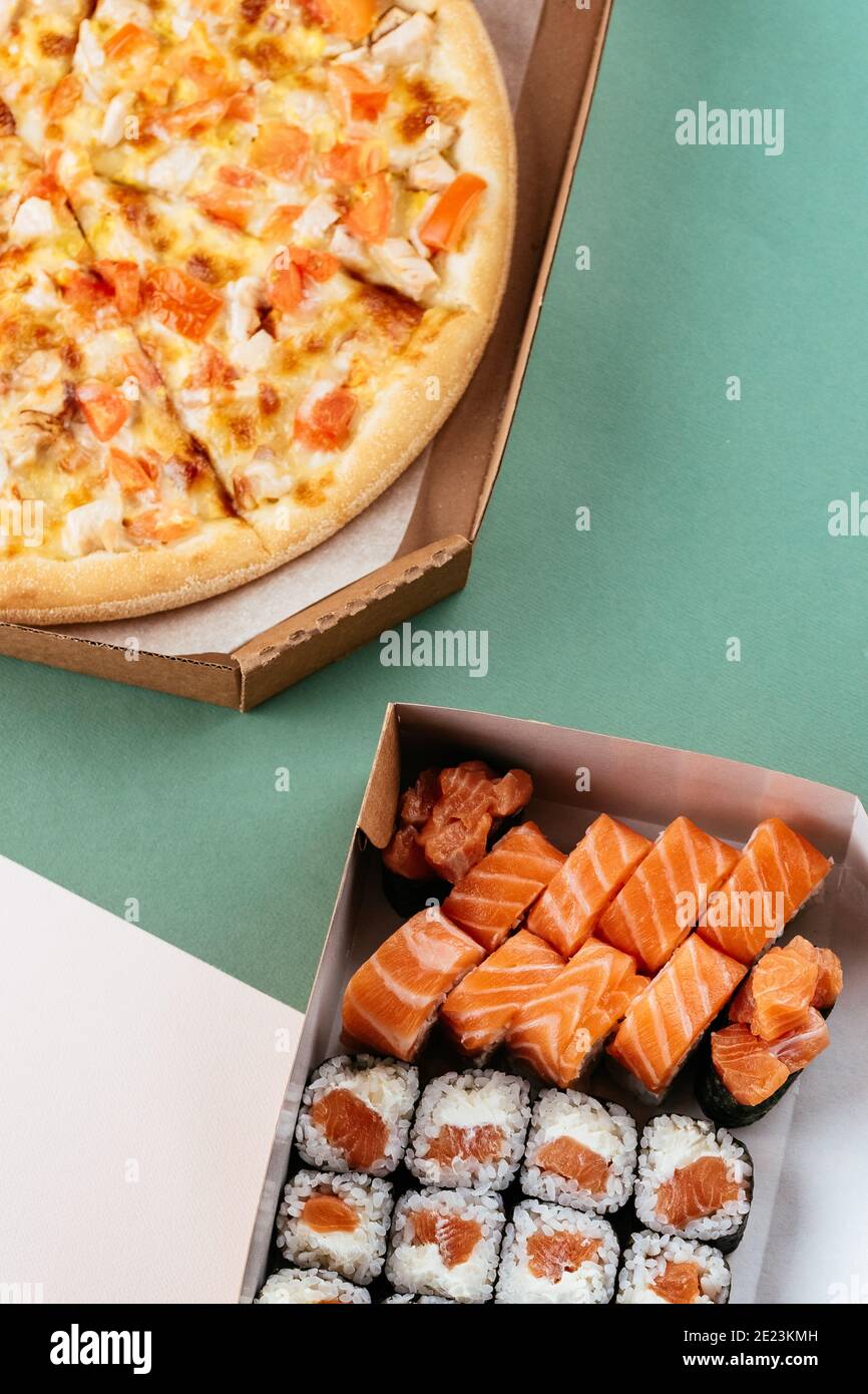 Set of delivery food. pizza sushi rolls Stock Photo - Alamy