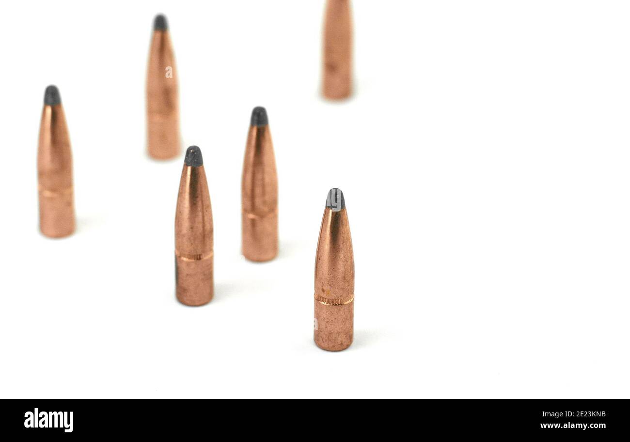 A rifle bullet, empty shell, gunpowder on white background. Hunting ...