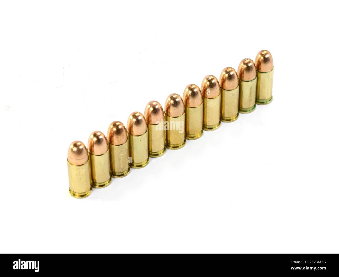 7.65 mm bullet for a gun isolated on white background Stock Photo - Alamy