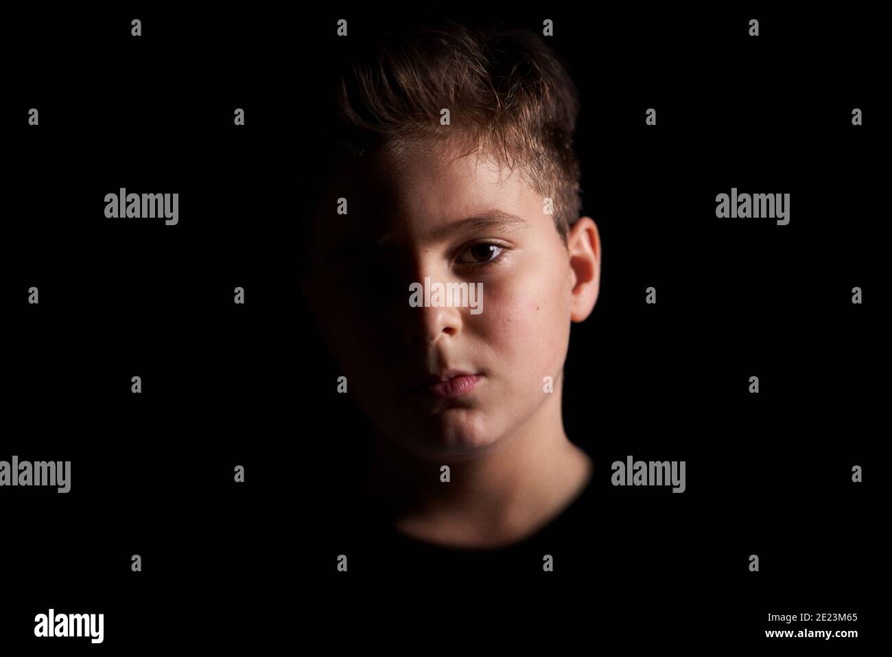 Preteen boy serious face hi-res stock photography and images - Alamy