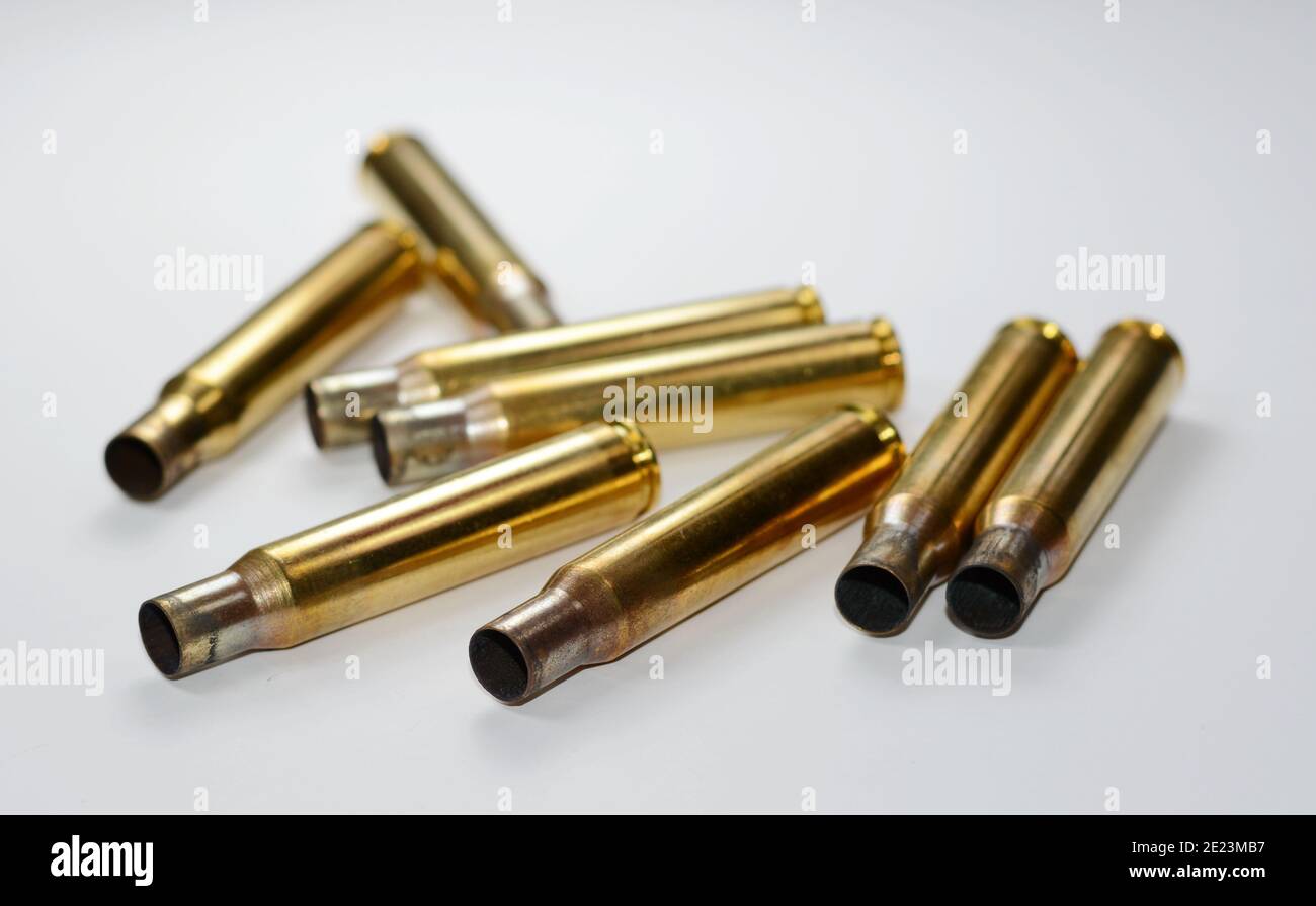 Hunting ammunition and empty rifle bullet cartridges Stock Photo - Alamy
