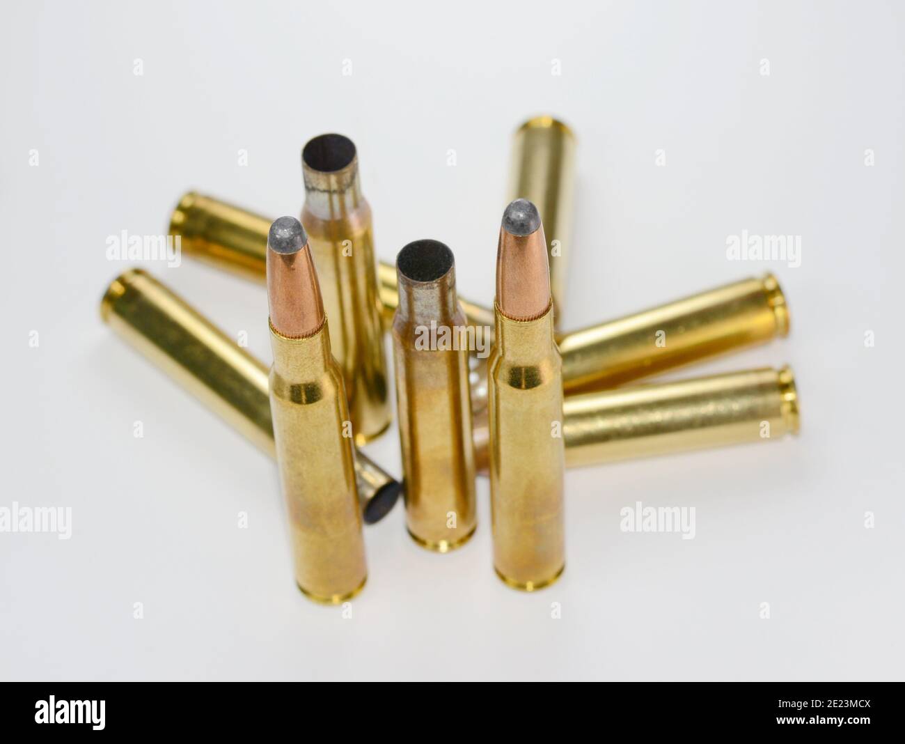 Hunting ammunition and empty rifle bullet cartridges Stock Photo - Alamy