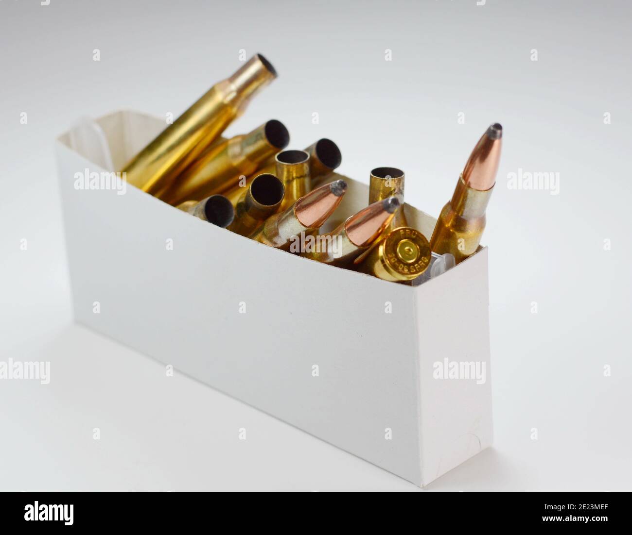Hunting ammunition and empty rifle bullet cartridges Stock Photo - Alamy