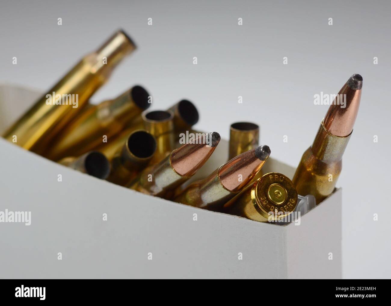 Hunting ammunition and empty rifle bullet cartridges Stock Photo - Alamy