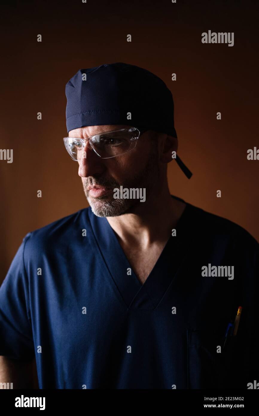 Middle aged male doctor hi-res stock photography and images - Alamy