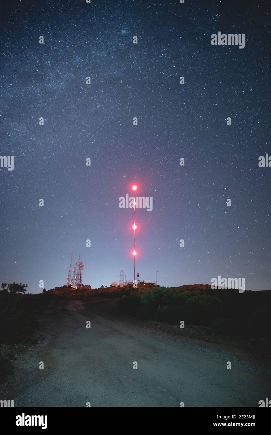 Cell tower under night sky Stock Photo - Alamy