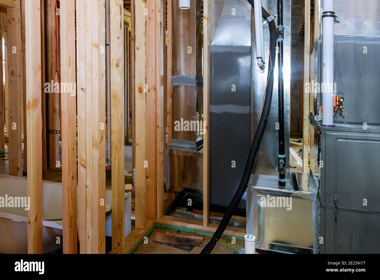 New home construction with installation of heating system in basement ...