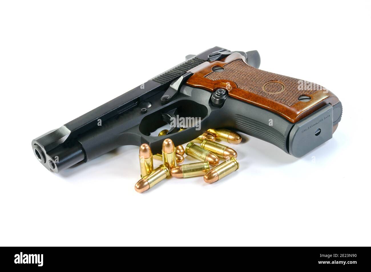 Studio shot of 7,65 mm gun with bullets Stock Photo - Alamy