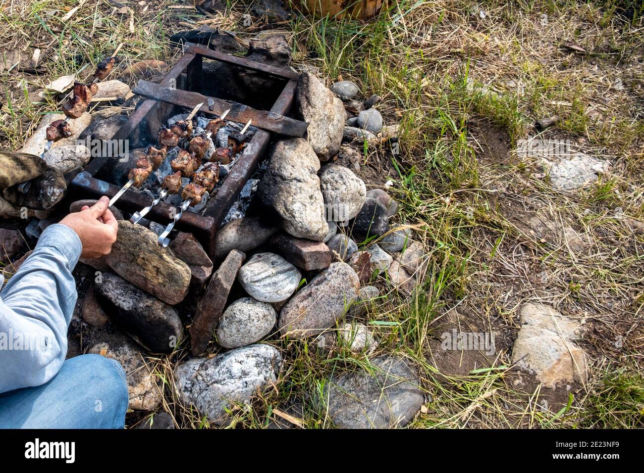 Close up hands turn beef hi-res stock photography and images - Alamy