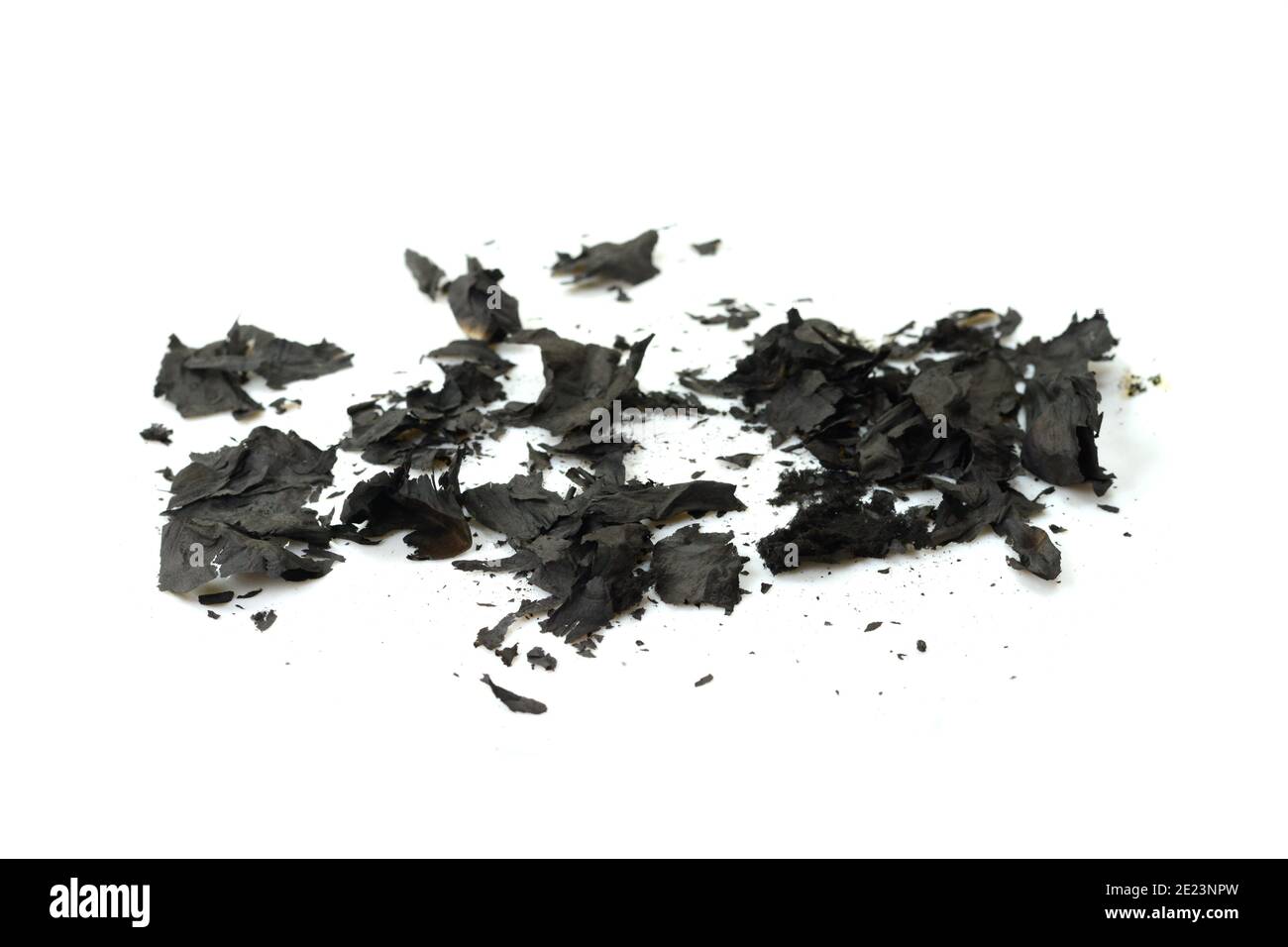 Burnt paper on a white background. The ashes of the paper. Charred ...
