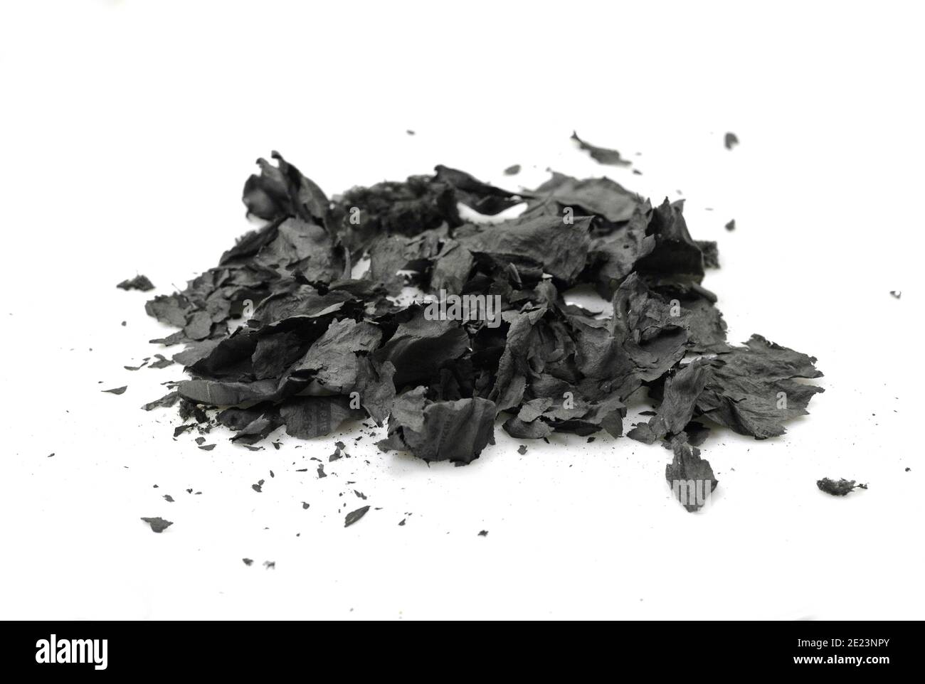 Burnt paper on a white background. The ashes of the paper. Charred ...