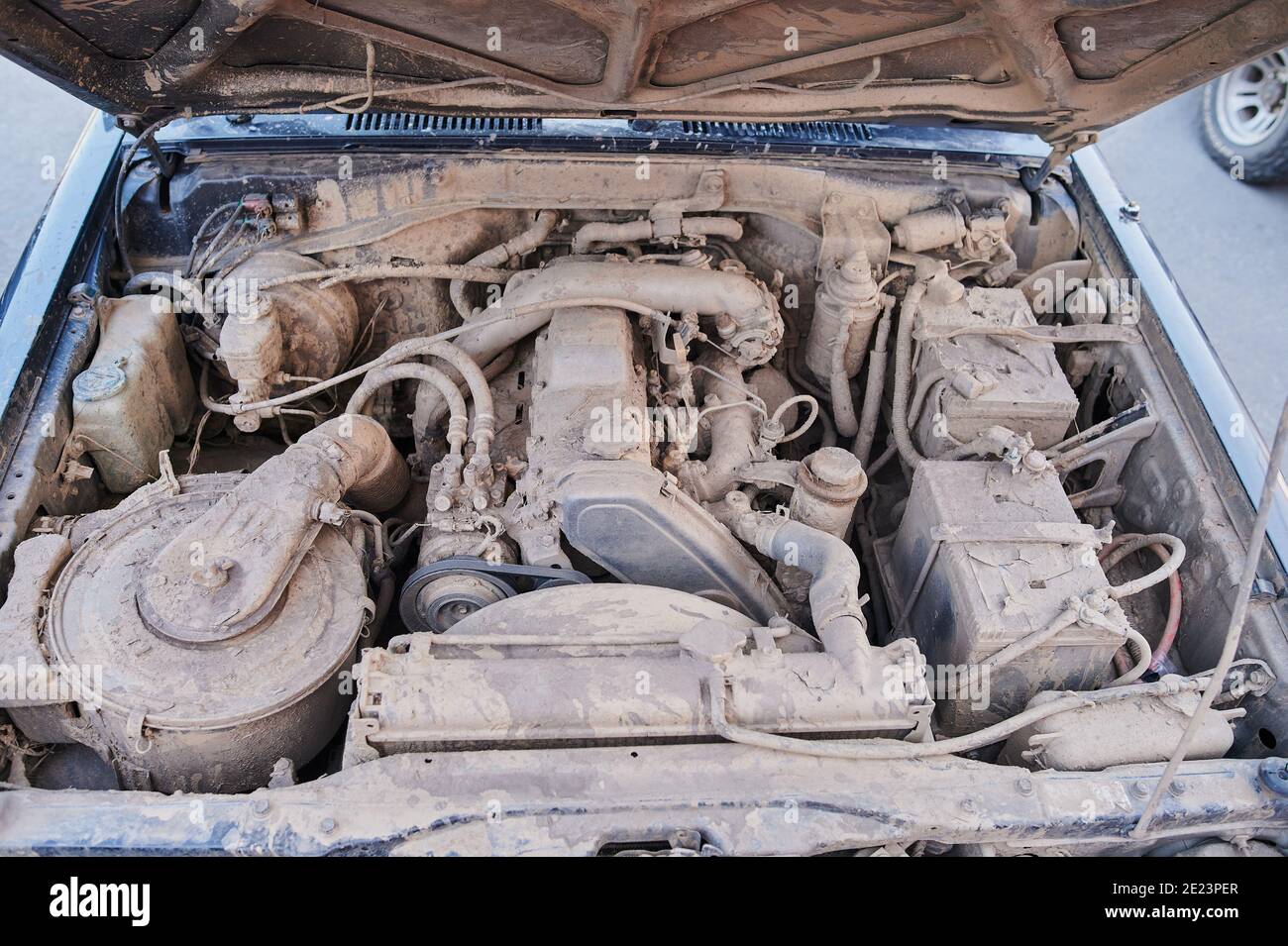 Dusty details of a flat-four boxer car engine compartment under the ...