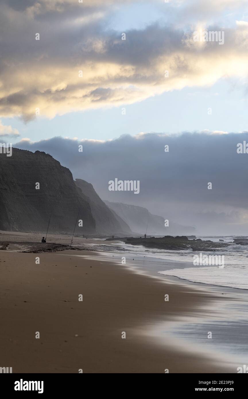 Vertical shot of a restful beach on a cloudy day Stock Photo - Alamy