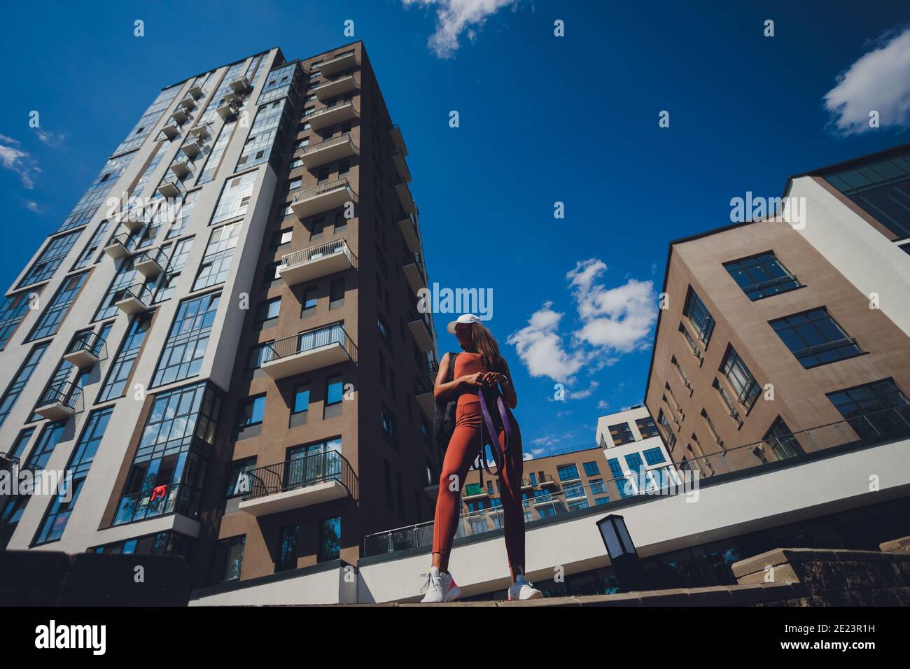Female athlete sweating after climbing stairs, running and exercising ...