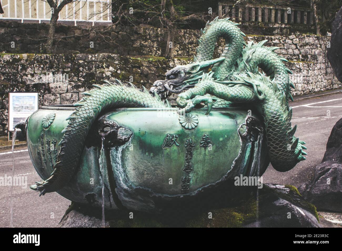 Selective focus shot of a dragon sculpture-fountain in Nikko, Japan ...