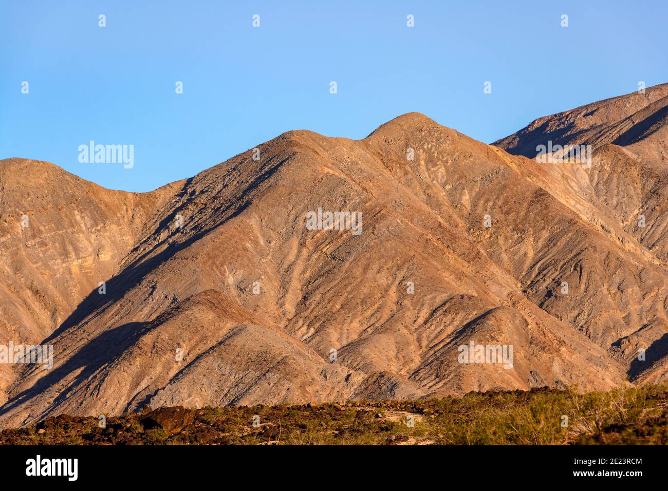 Beautiful scenery in Death Valley National Park. Orange hills and ...