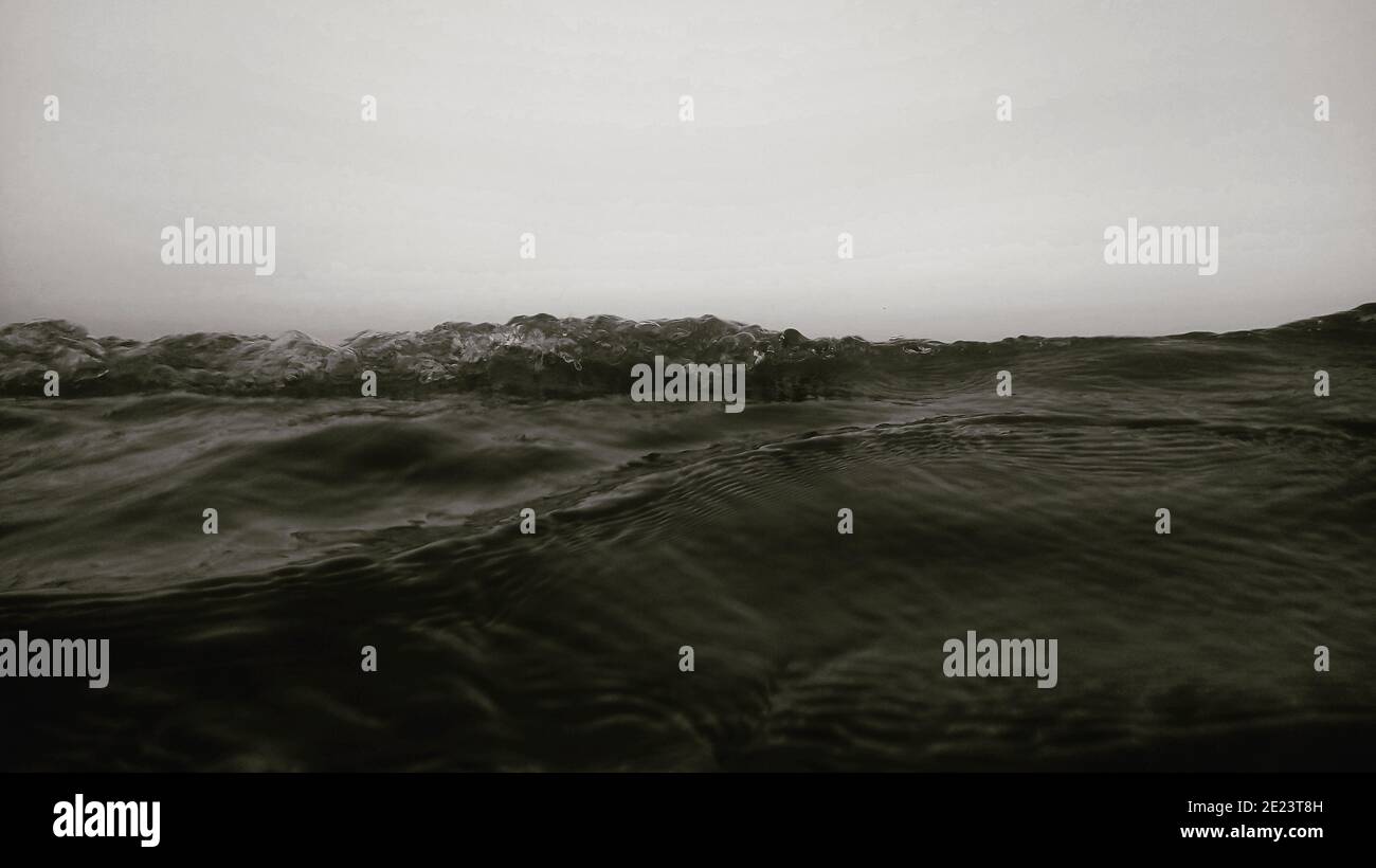 Waves breaking at night hi-res stock photography and images - Alamy