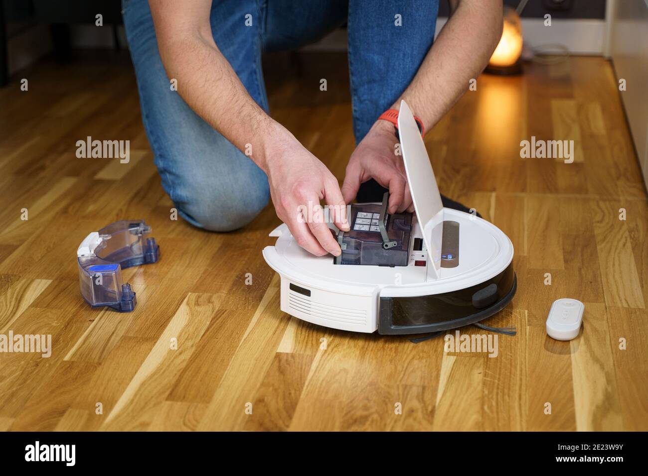 Housework and technology concept. Maintenance and service of robot ...