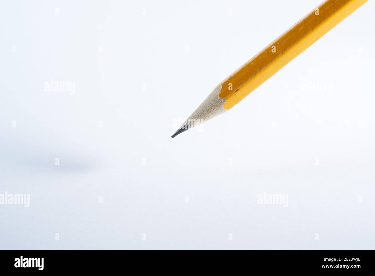 Sharp pencil in the light backgroundons Stock Photo - Alamy