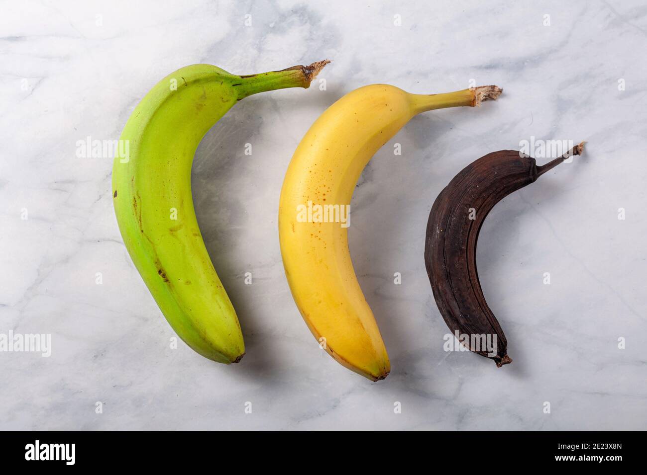 Process of ripening for banana showing a fresh green to yellow banana ...