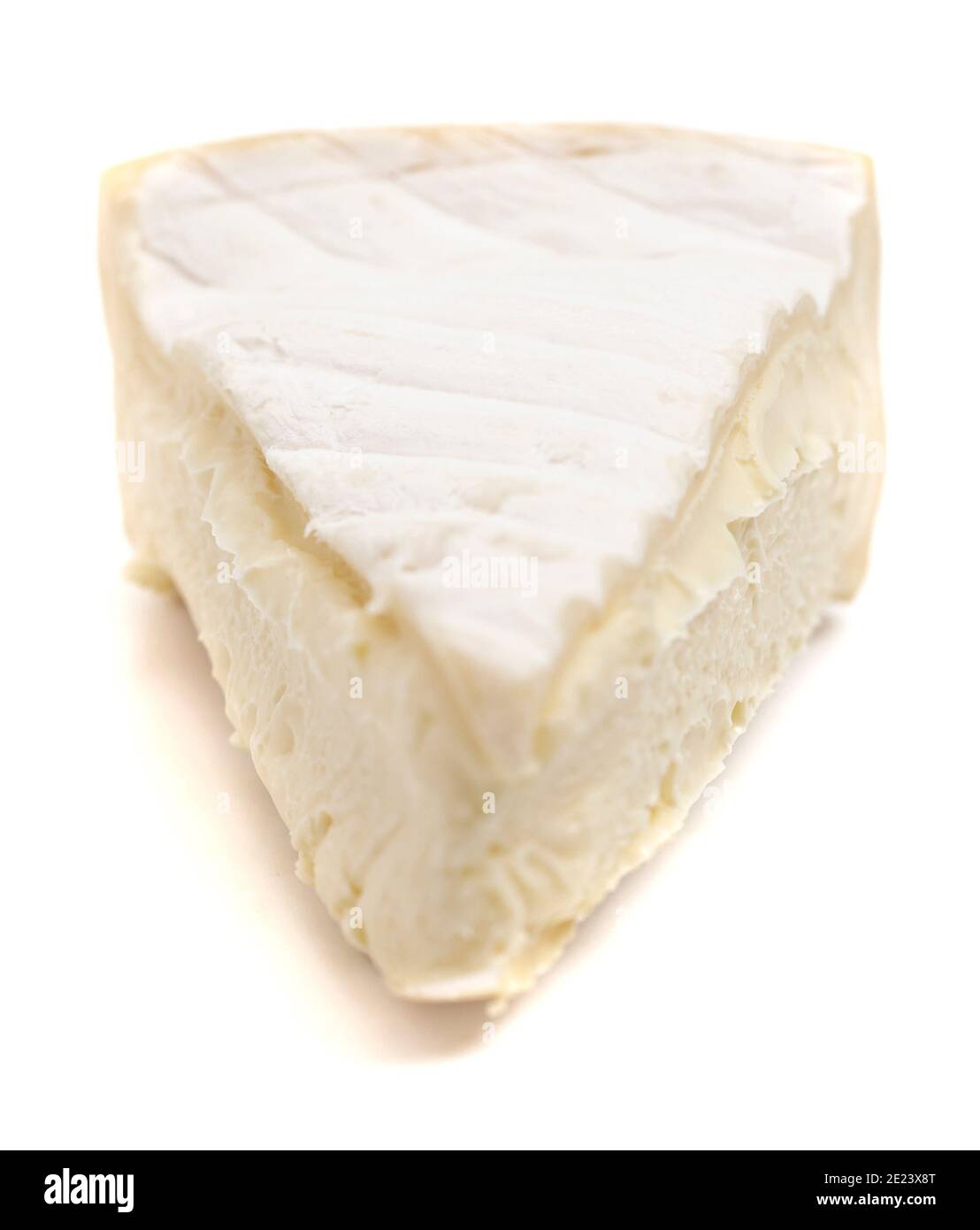 Triangle Slice of a Soft White Cheese with a Rine Isolated on a White ...