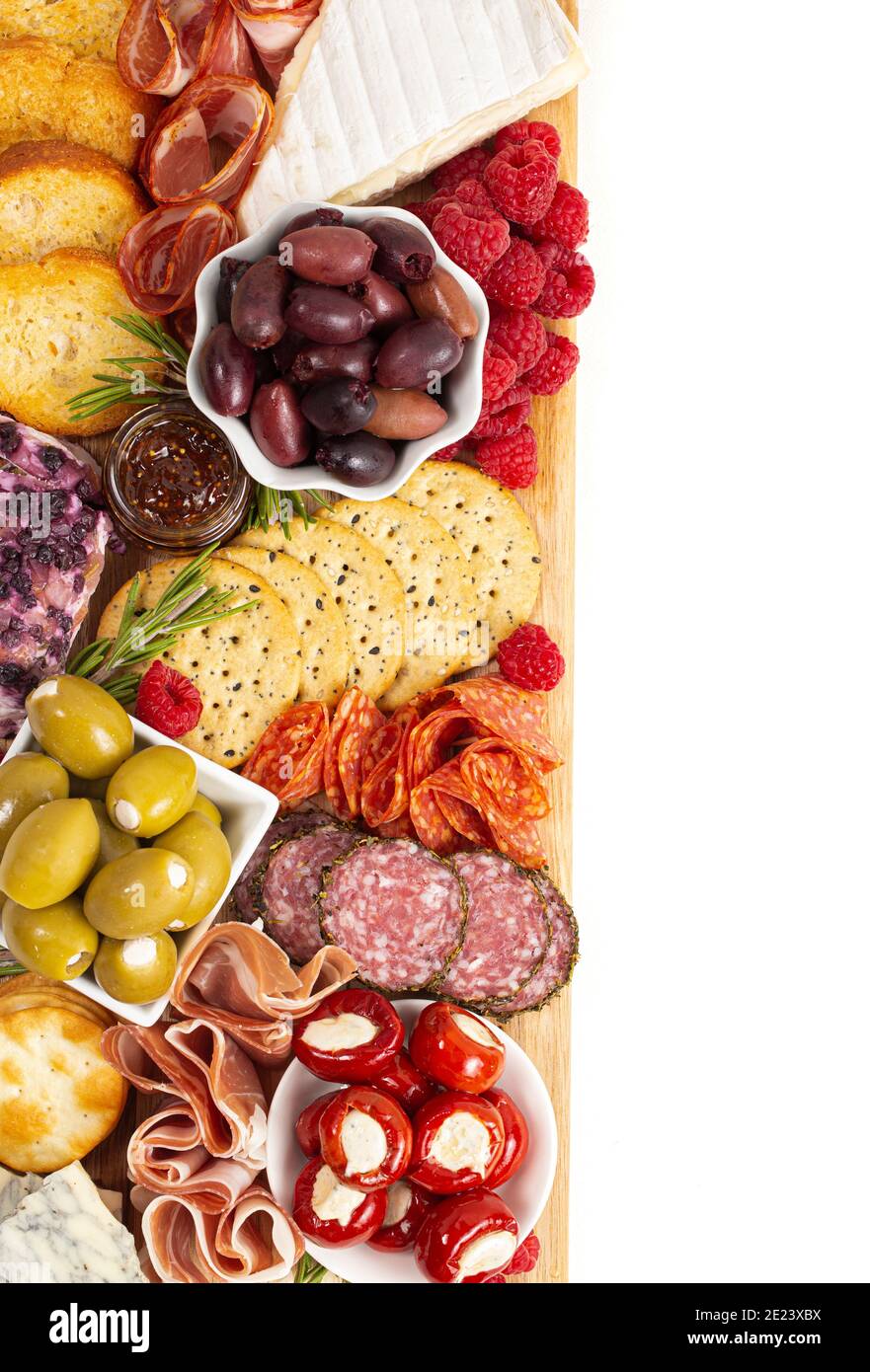 Savoury Charcuterie Board Covered in Meats Olives Peppers Berries and ...