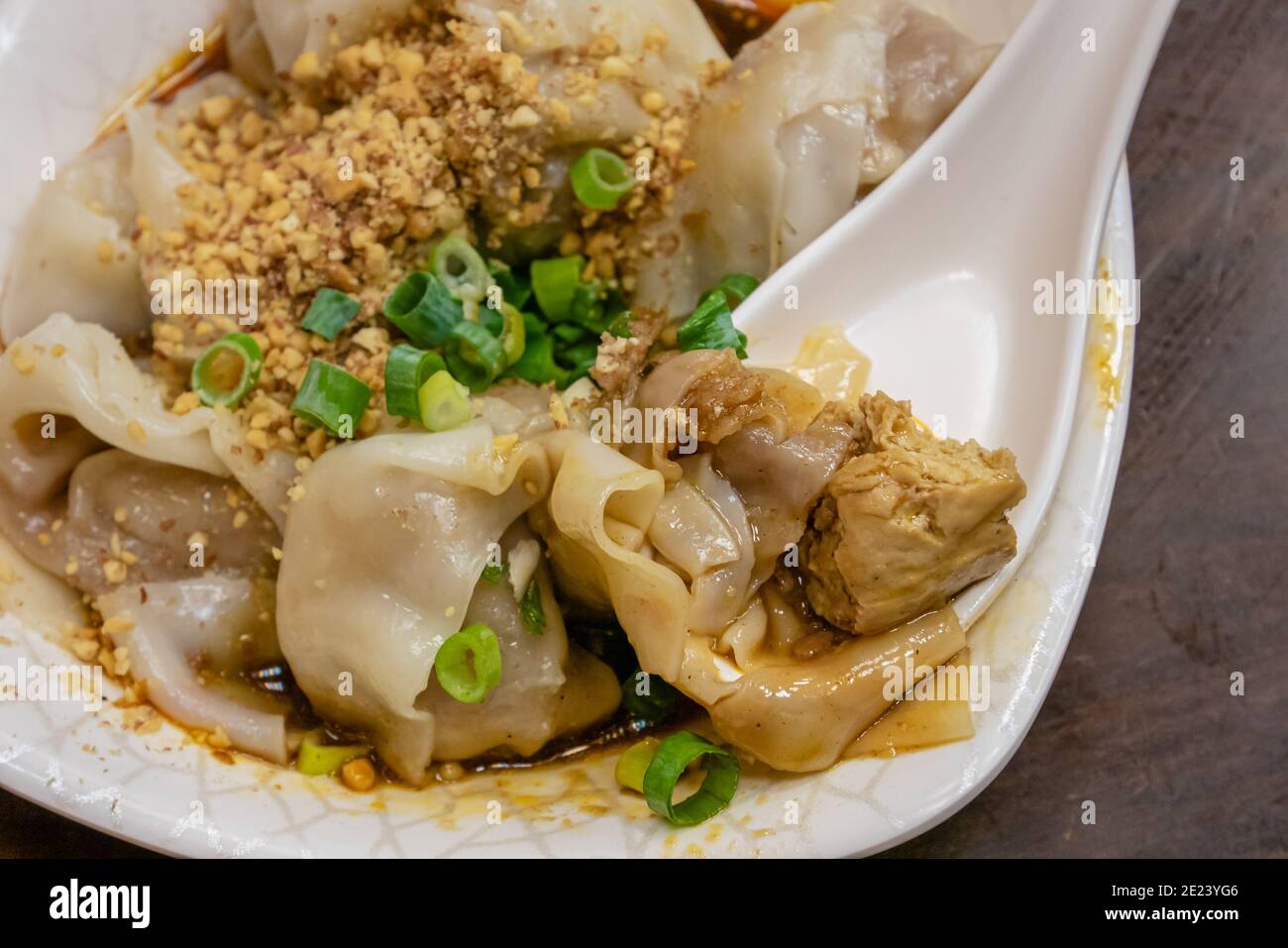 The close up of Taiwanese traditional steamed spicy stinky tofu wontons ...
